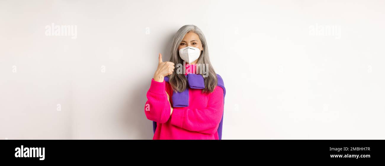 Covid, pandemic and social distancing concept. Cheerful and stylish ...