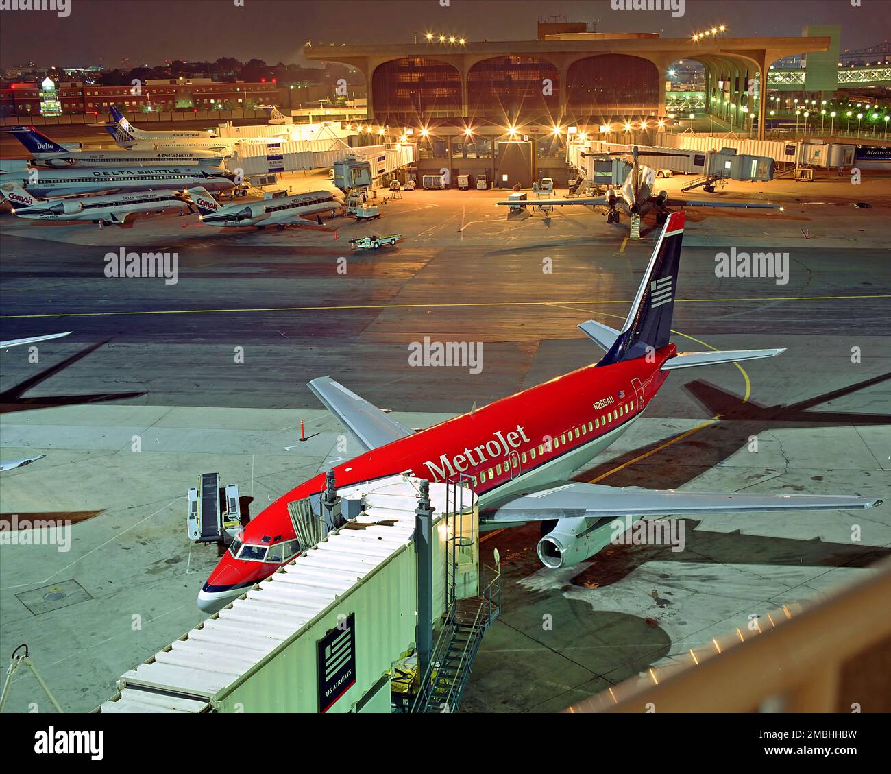 US Airways Boeing 737 metrojet parked at gate, airport terminal ...