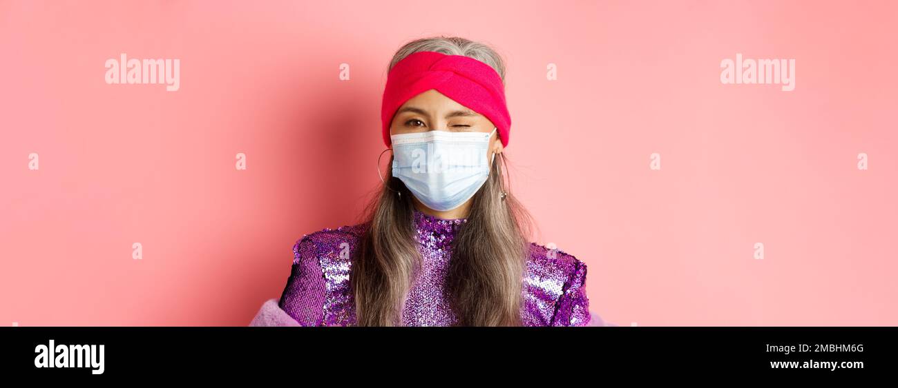 Woman wearing party dress mask hi-res stock photography and images - Alamy