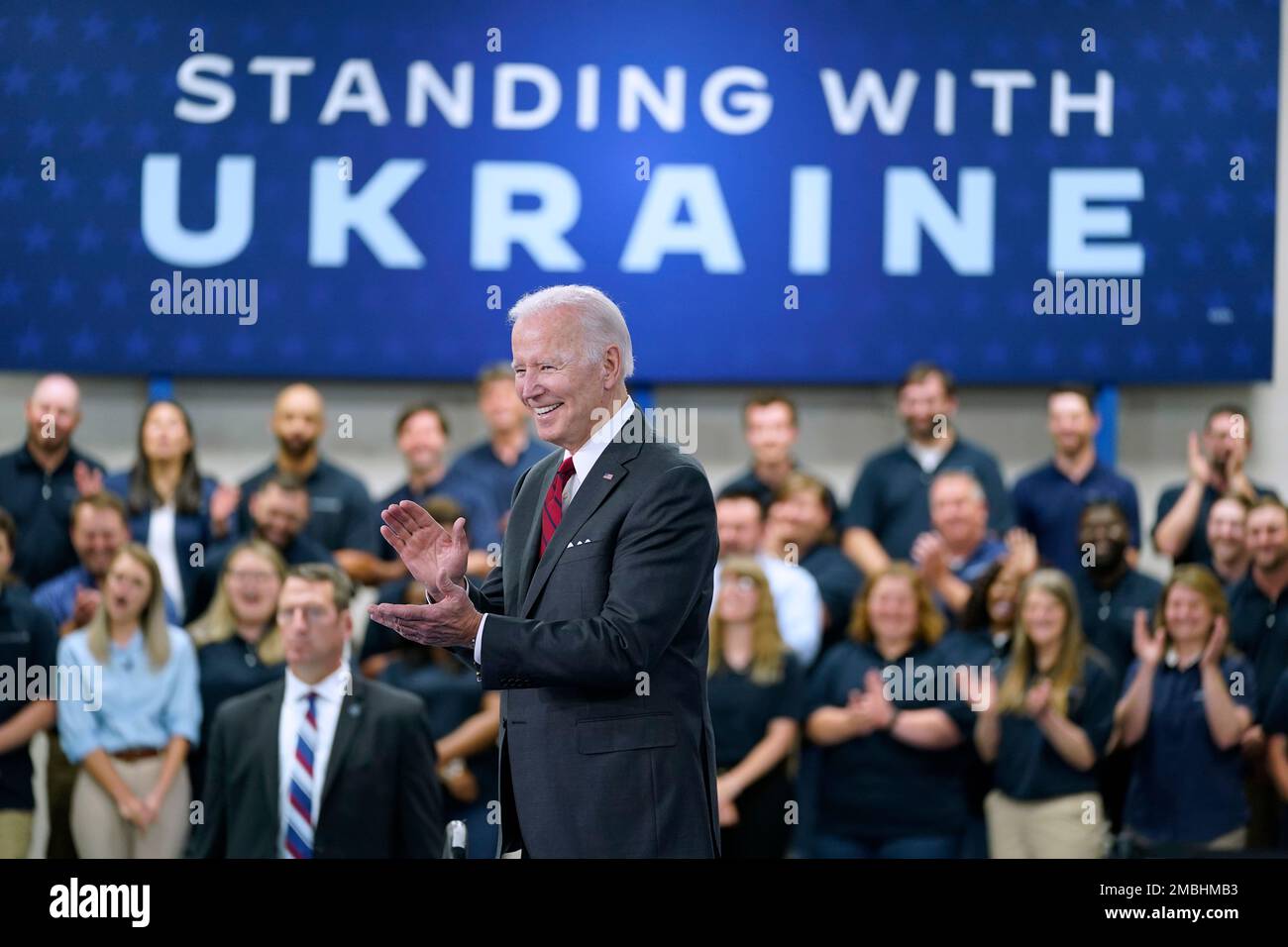 President Joe Biden smiles as Linda Griffin introduces him to speak at ...