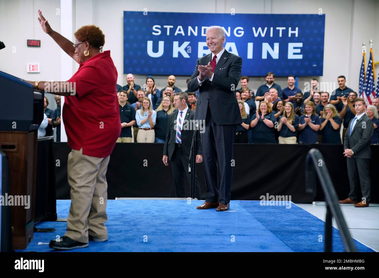 President Joe Biden smiles as Linda Griffin introduces him to speak at ...