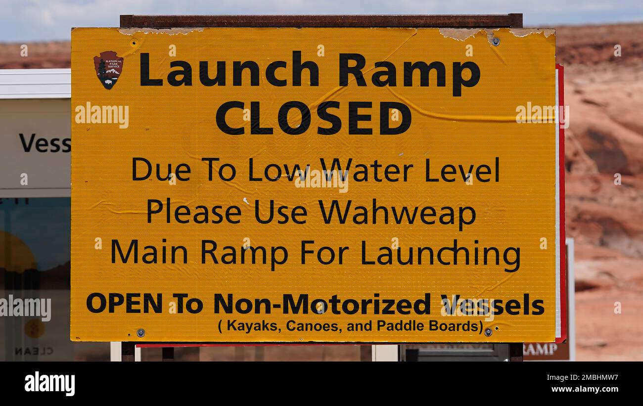 FILE - A "Launch Ramp Closed" sign is shown at the Antelope Point ...