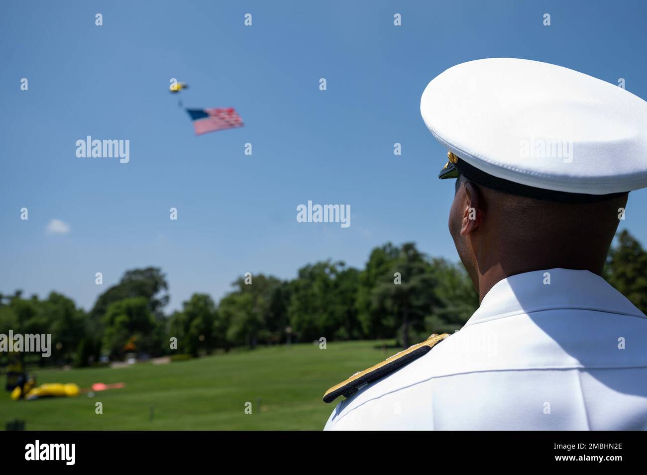 Rear Adm. Lex Walker, Commander, Navy Recruiting Command, watches the ...