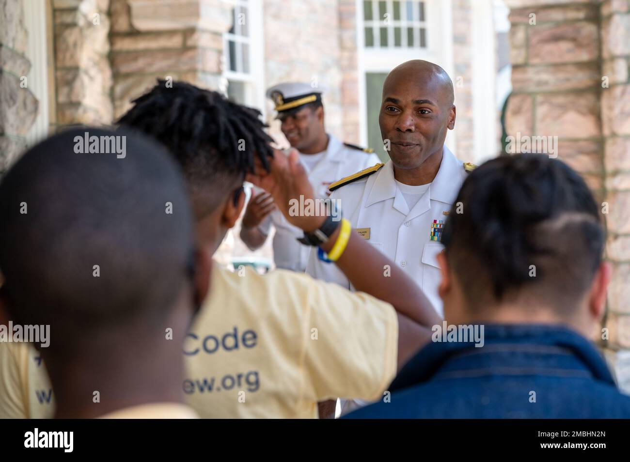 Rear Adm. Lex Walker, Commander, Navy Recruiting Command, talks with ...