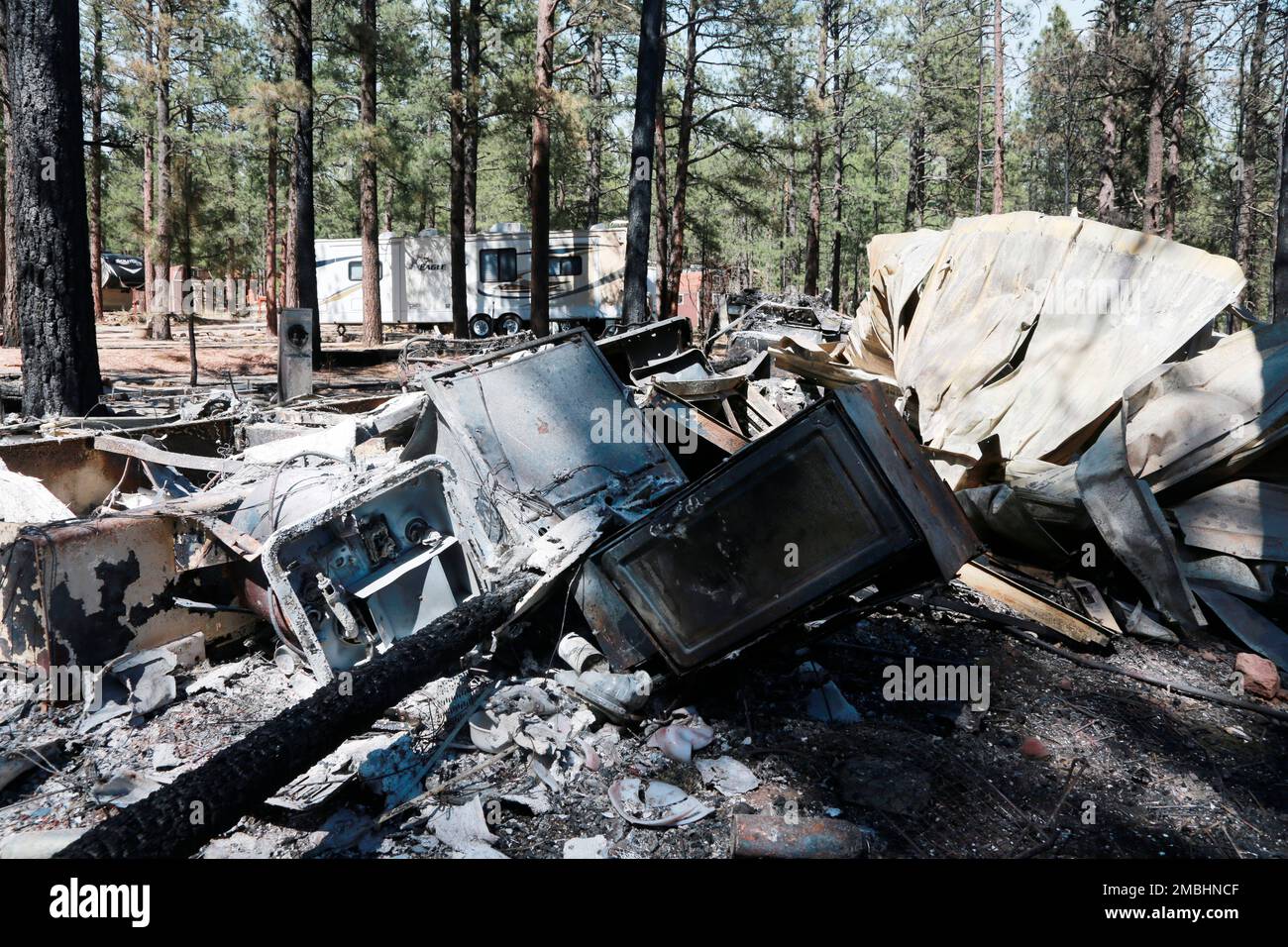 The remains of a burned RV are pictured following a wildfire near Las ...