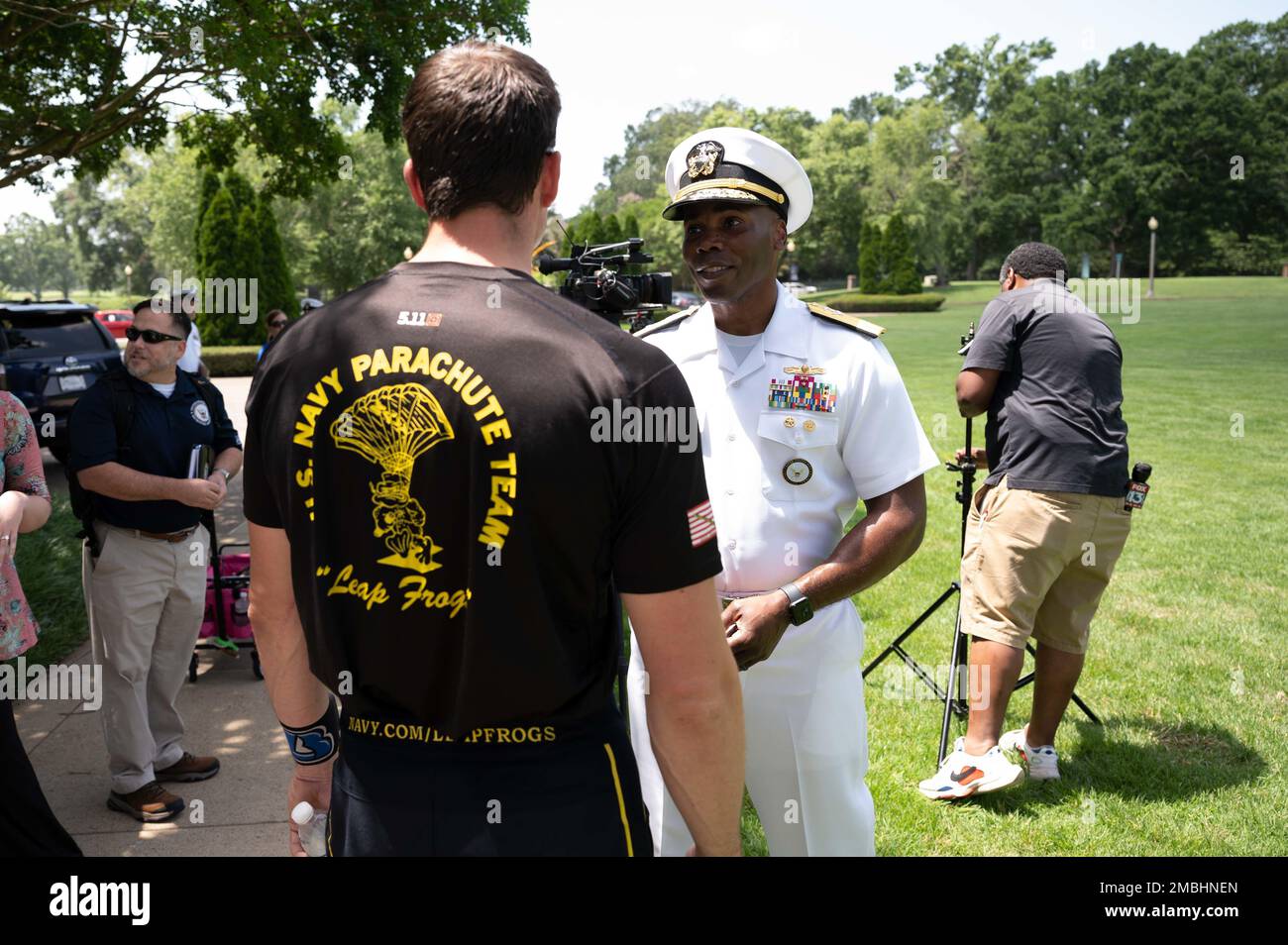 Rear Adm. Lex Walker, Commander, Navy Recruiting Command, talks to Lt ...