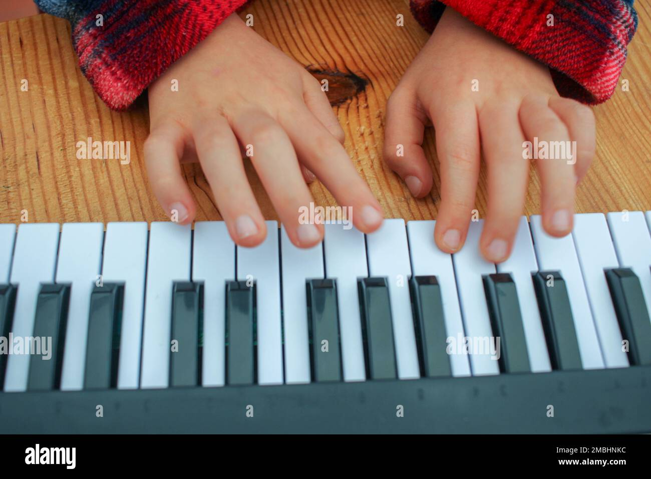 my son playing a toy keyboard at home Stock Photo - Alamy