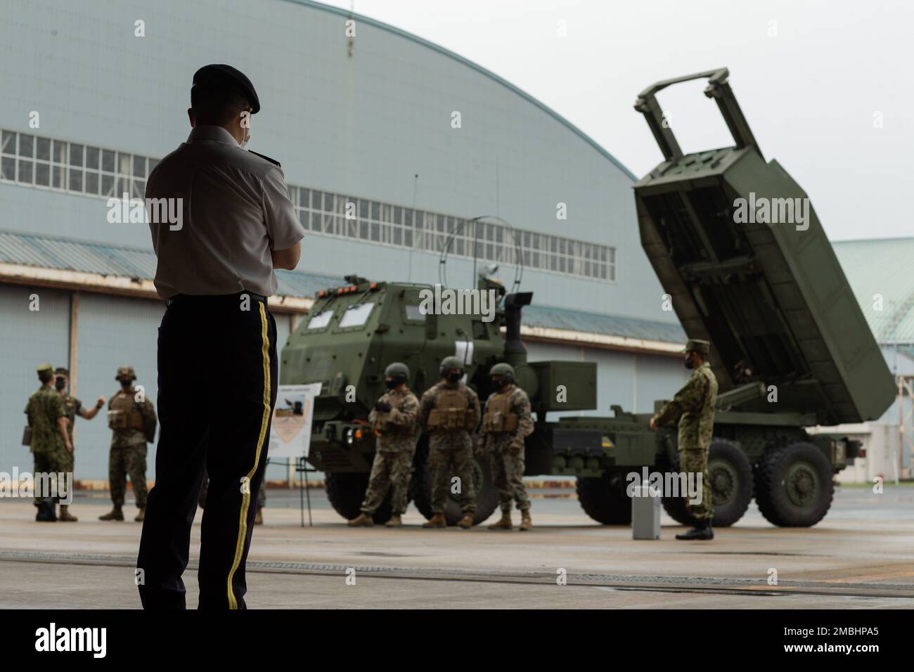 A soldier with the Japan Ground Self-Defense Force observes a U.S ...