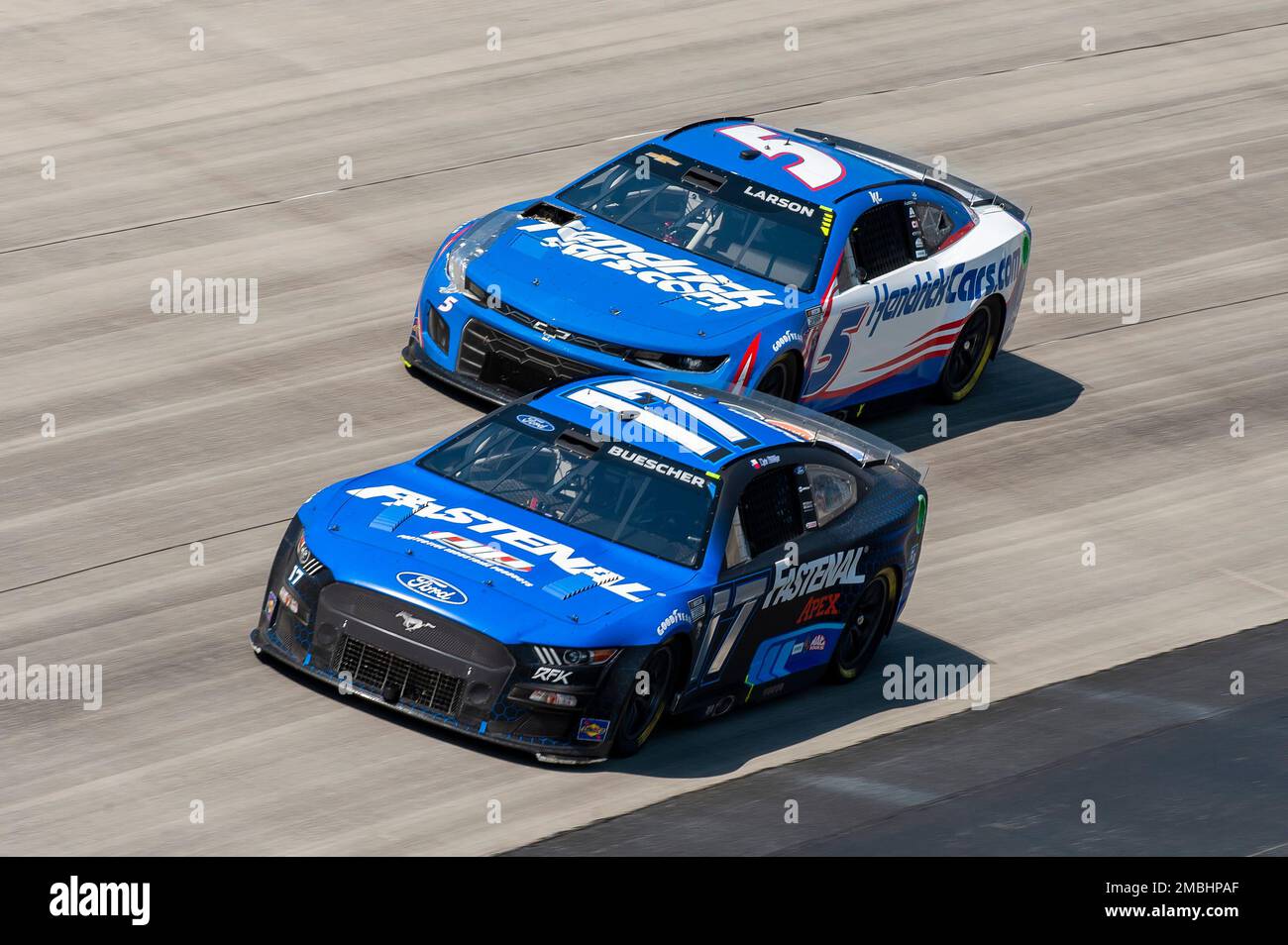 Chris Buescher (17) and Kyle Larson (5) races in the NASCAR Cup Series ...