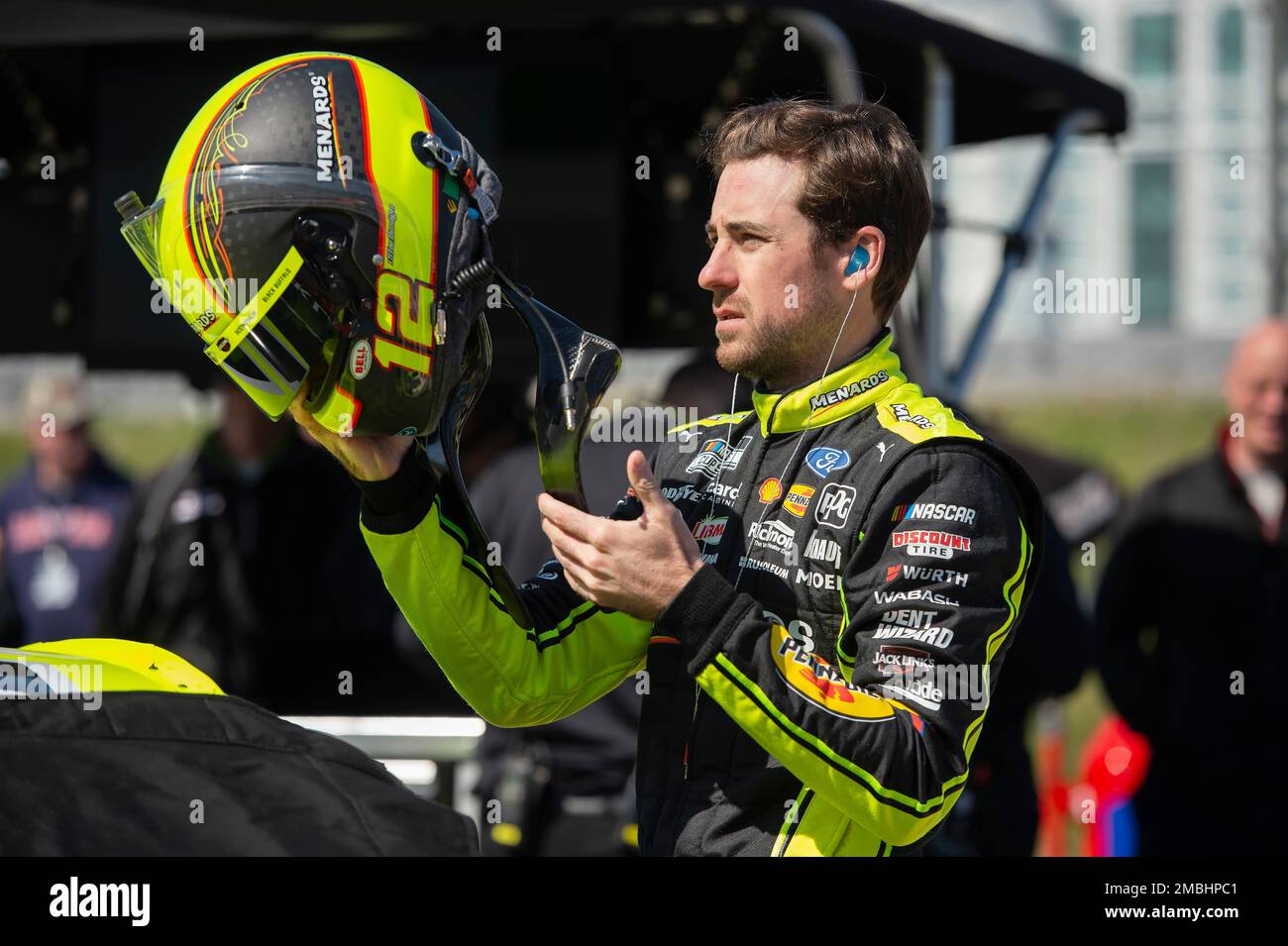 Ryan Blaney (12) puts on his helmet before NASCAR Cup Series practice ...