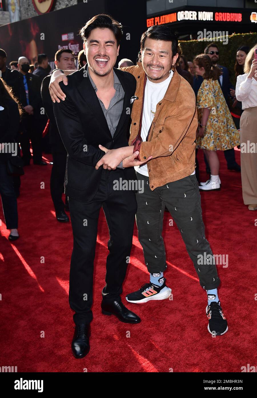 Remy Hii, left, and Ronny Chieng arrive at the Los Angeles premiere of ...