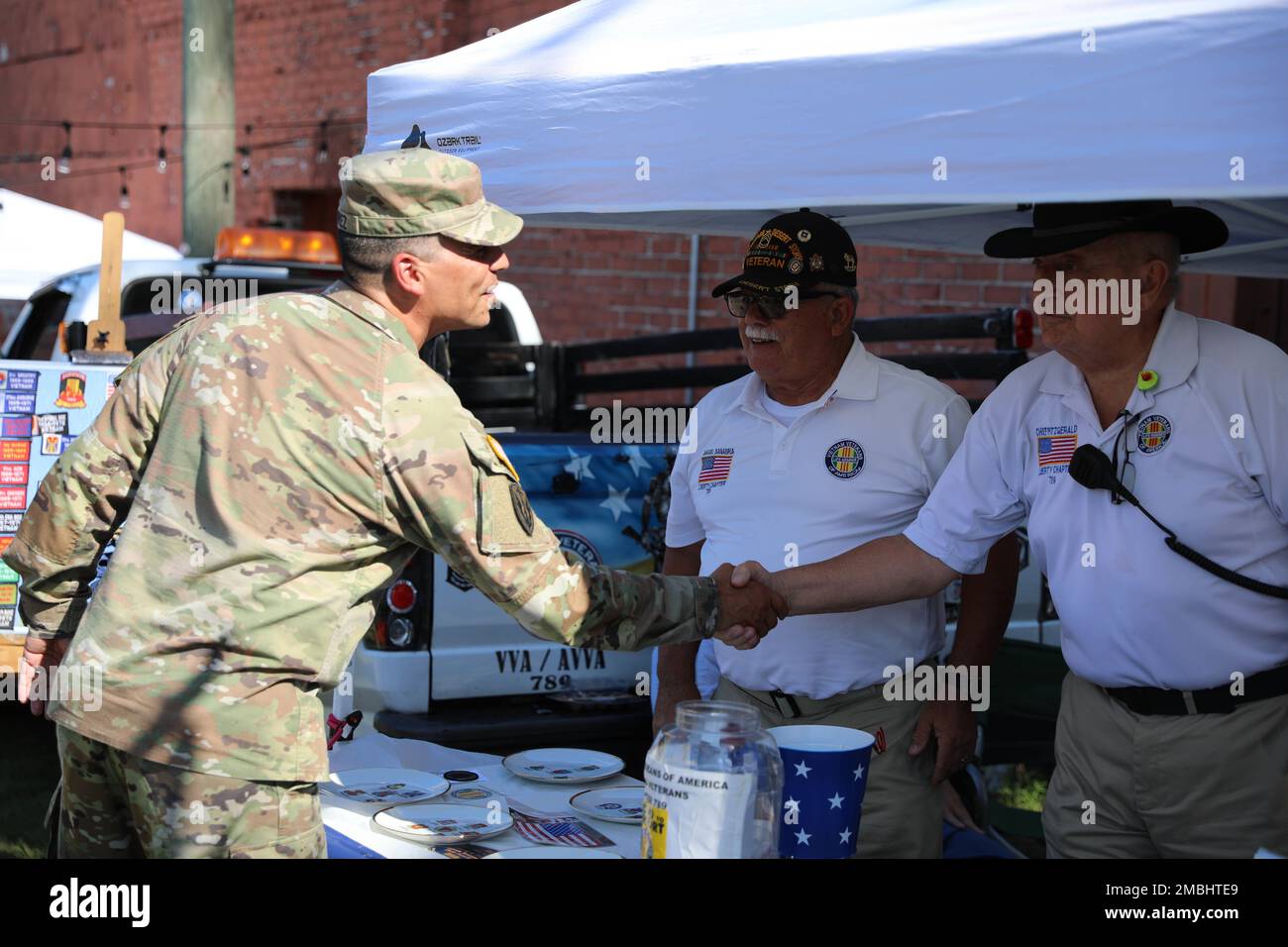 Col. Manuel F. Ramirez, Fort Stewart Garrison Commander, shakes the ...