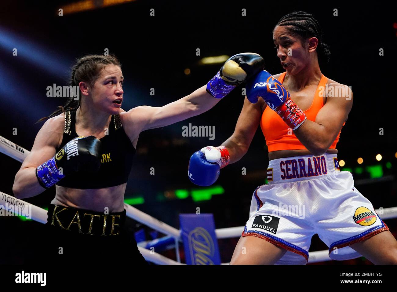 Ireland's Katie Taylor, left, punches Amanda Serrano during the second ...