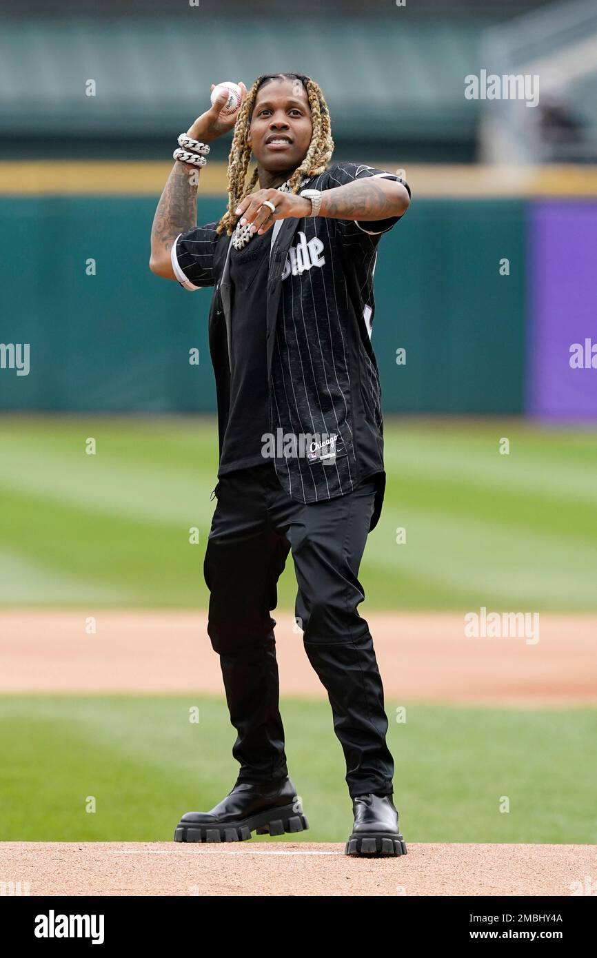 Chicago rapper Lil Durk throws out a ceremonial first pitch before a ...