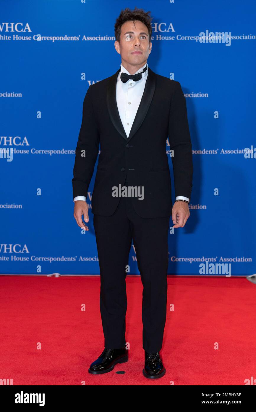 Olympian Apolo Anton Ohno poses for photographers as he arrive to the ...