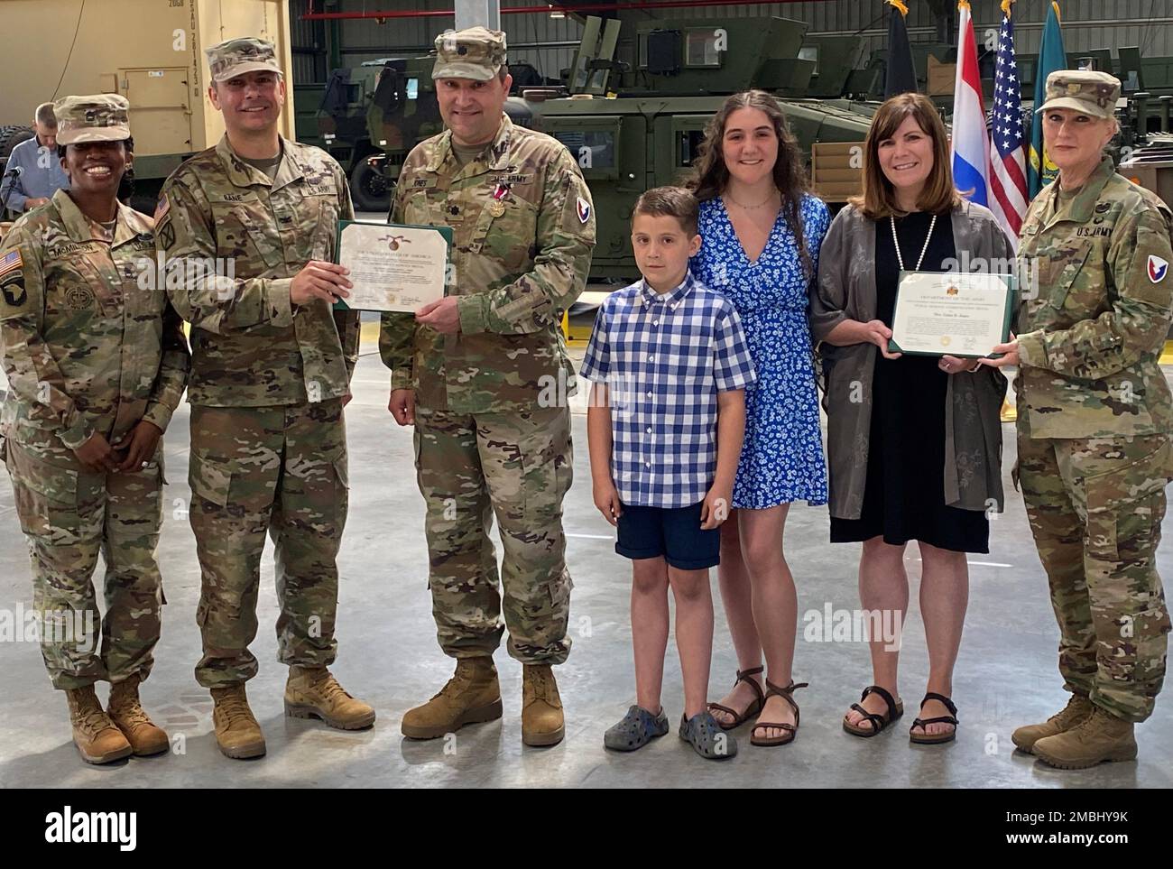 Army Lt. Col. Aaron Jones and his wife, Jenna, are recognized by the ...