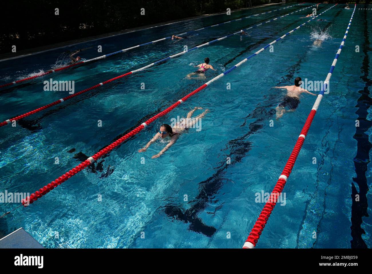 People swim in Prinzenbad outdoor pool in Berlin, Germany, Monday, May ...