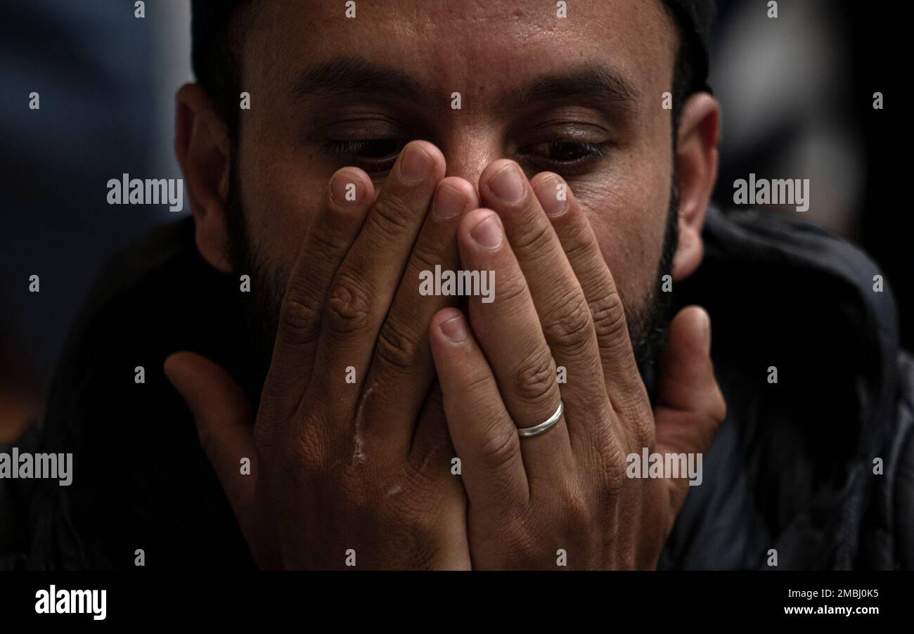 A man prays during Eid al-Fitr prayers in Bucharest, Romania, Monday ...