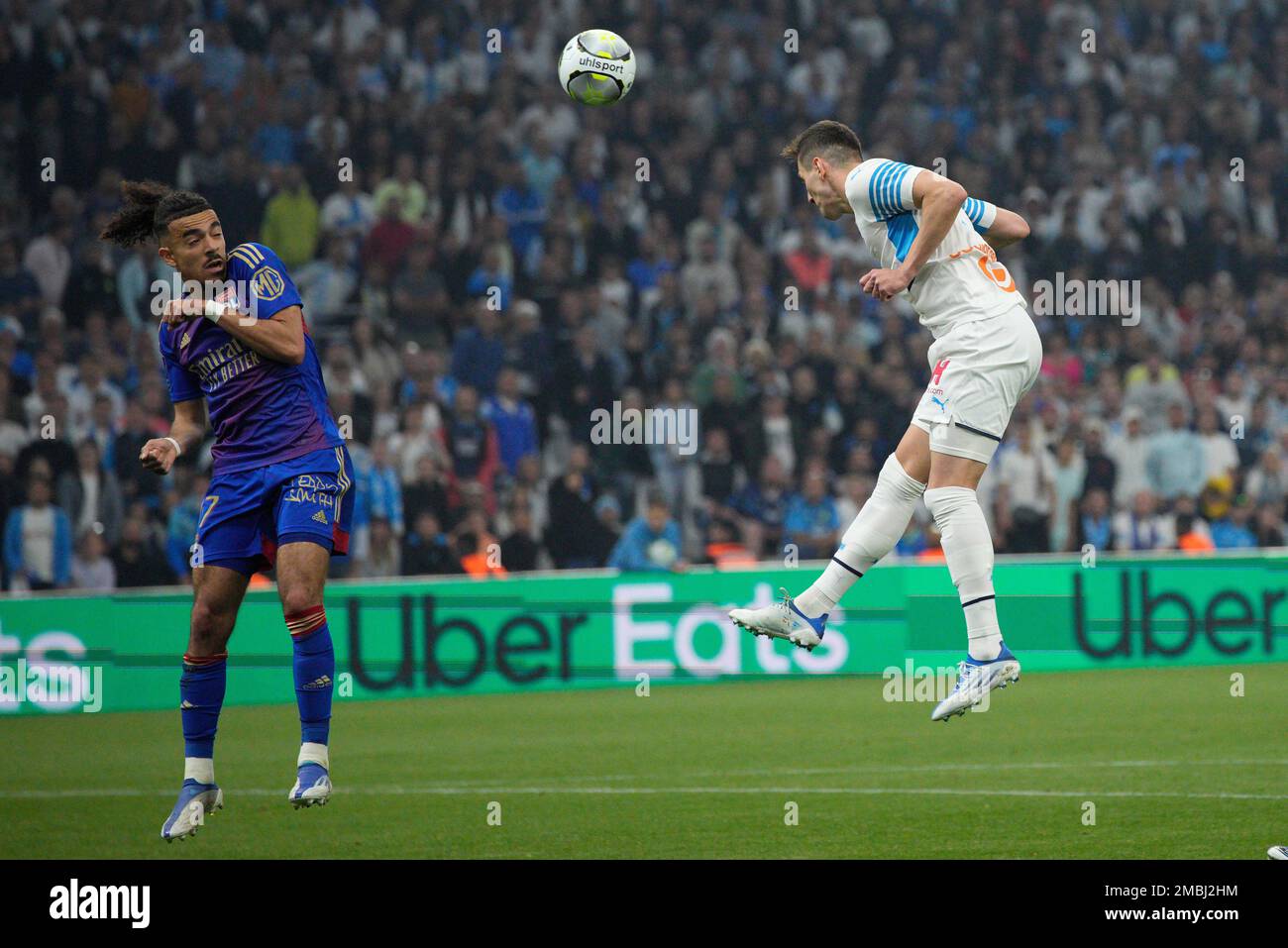 Marseille's Arkadiusz Milik, right, heads the ball and misses during ...