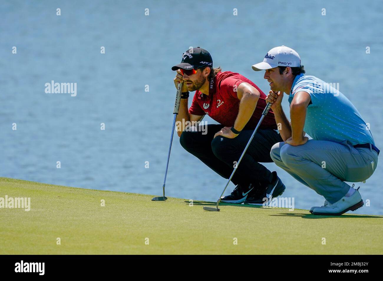 Patrick Rodgers, left, and Davis Riley, both of the United States, line ...