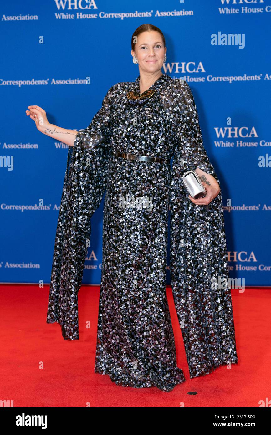 Drew Barrymore poses for photographers as she arrives to the annual ...