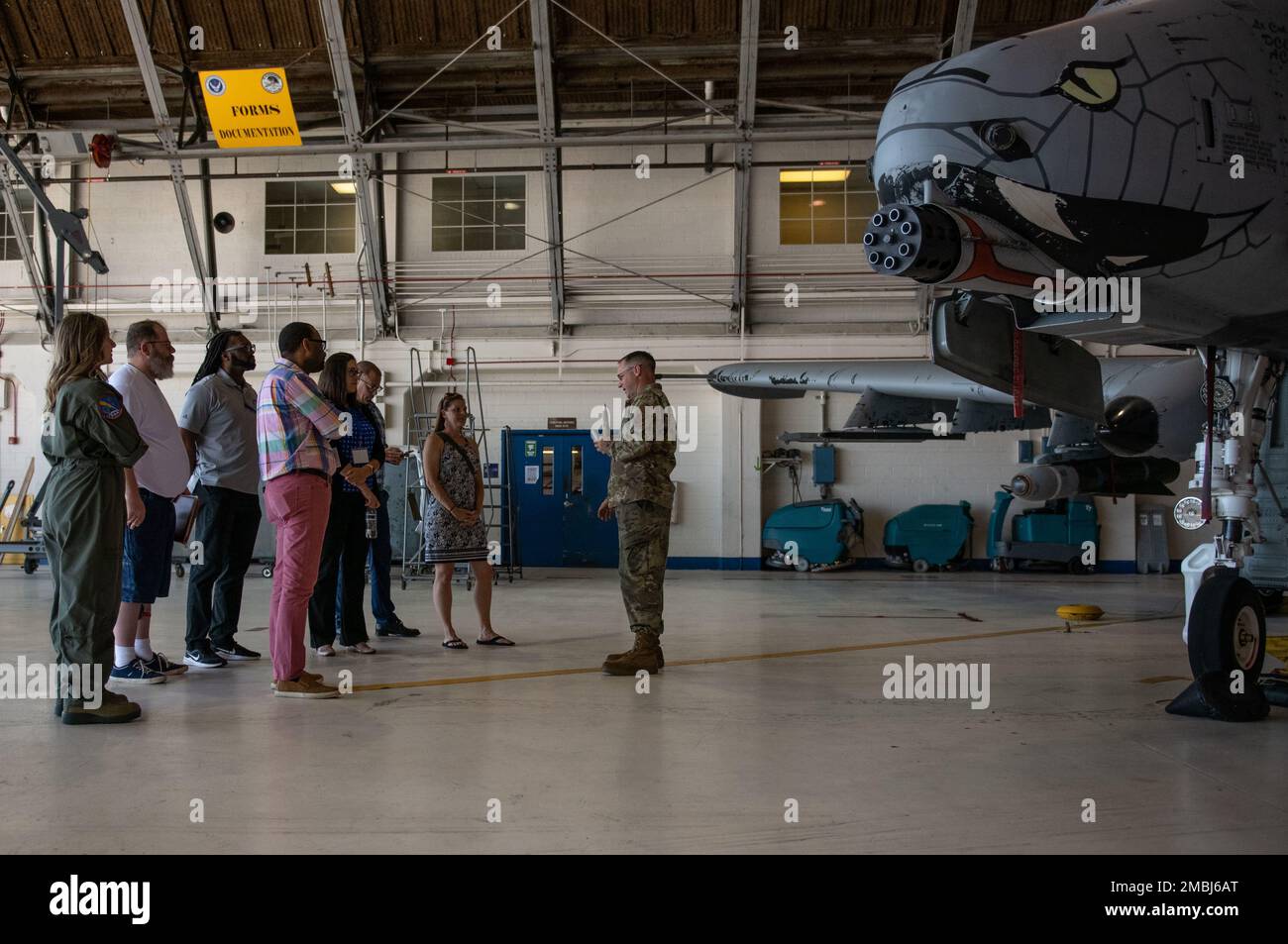 U.S. Air Force Staff Sgt. Aaron J. Barton speaks to members of ...