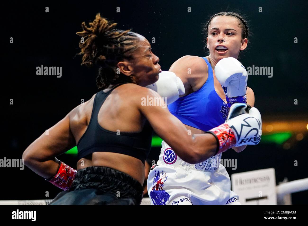 Australia's Skye Nicolson, right, punches Shanecqua Paisley Davis ...