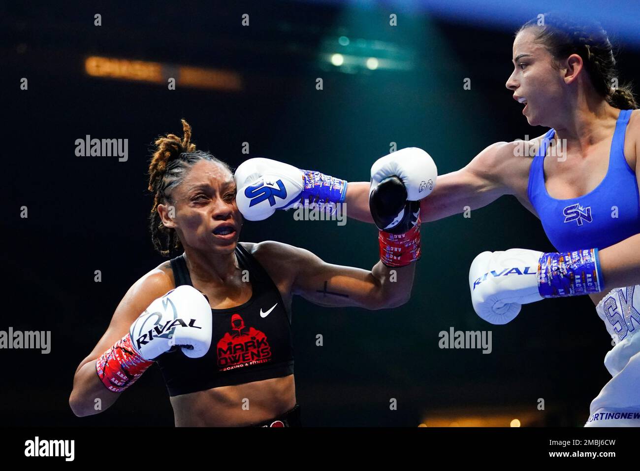 Australia's Skye Nicolson, right, punches Shanecqua Paisley Davis ...