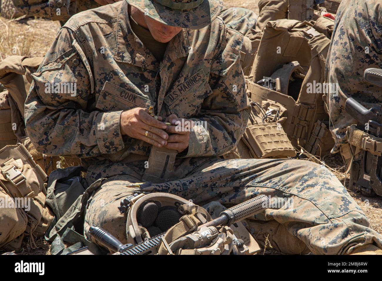 U.S. Marine Corps Lance Cpl. David Cook, a rifleman with Lima Company ...