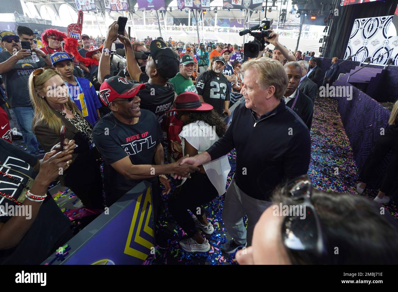 Roger Goodell, Commissioner of the NFL, interacts with fans during the ...