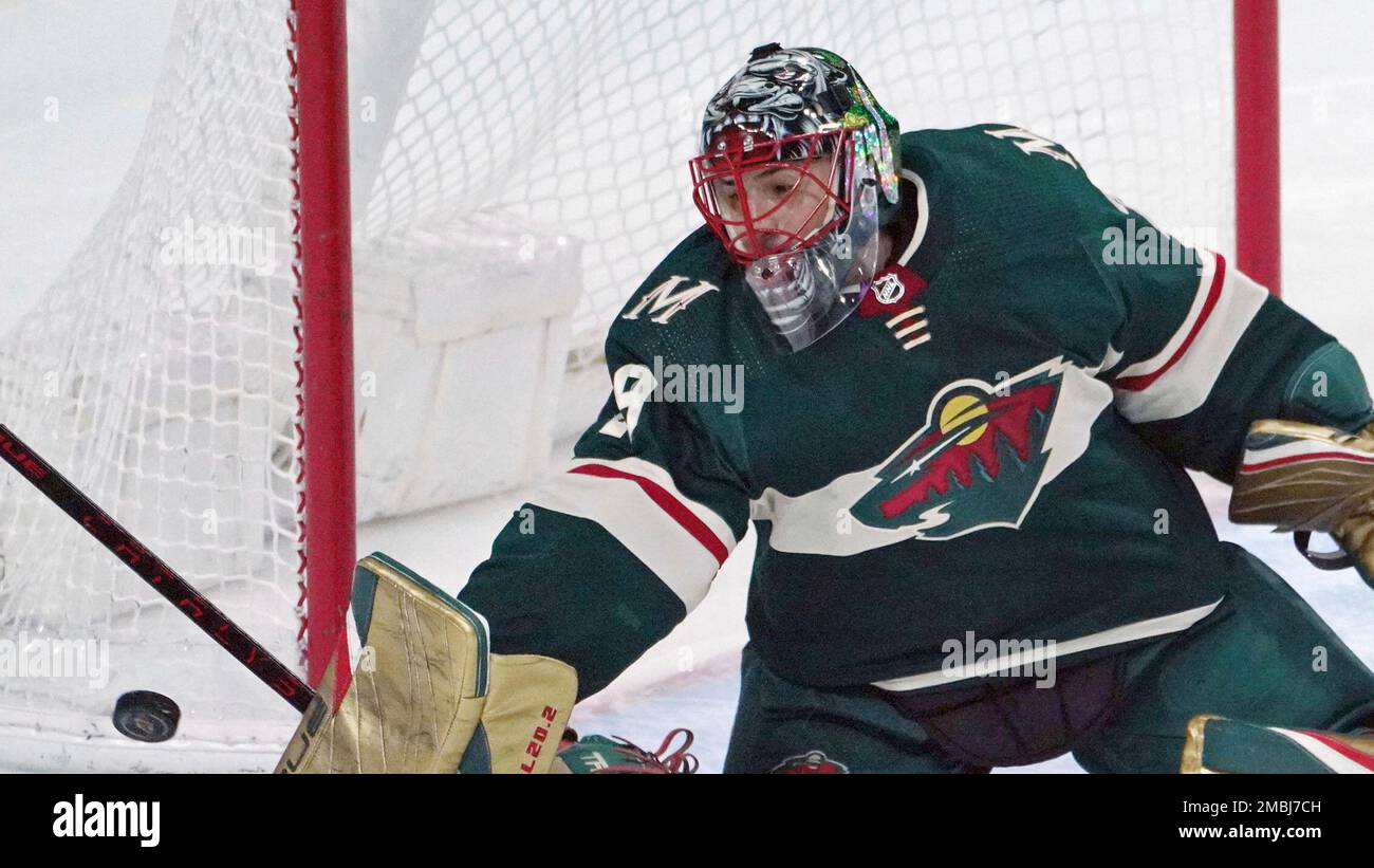 Minnesota Wild goalie Marc-Andre Fleury deflects a shot in an NHL ...