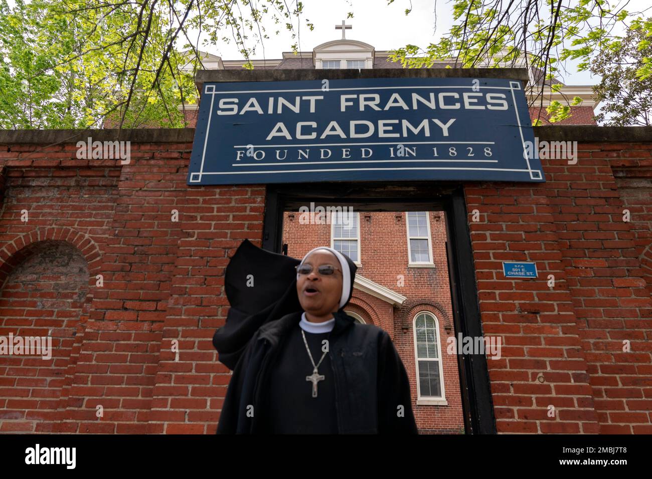 Sister Mary Ngina, a nun with the Oblate Sisters of Providence, has her habit blown in the wind ...