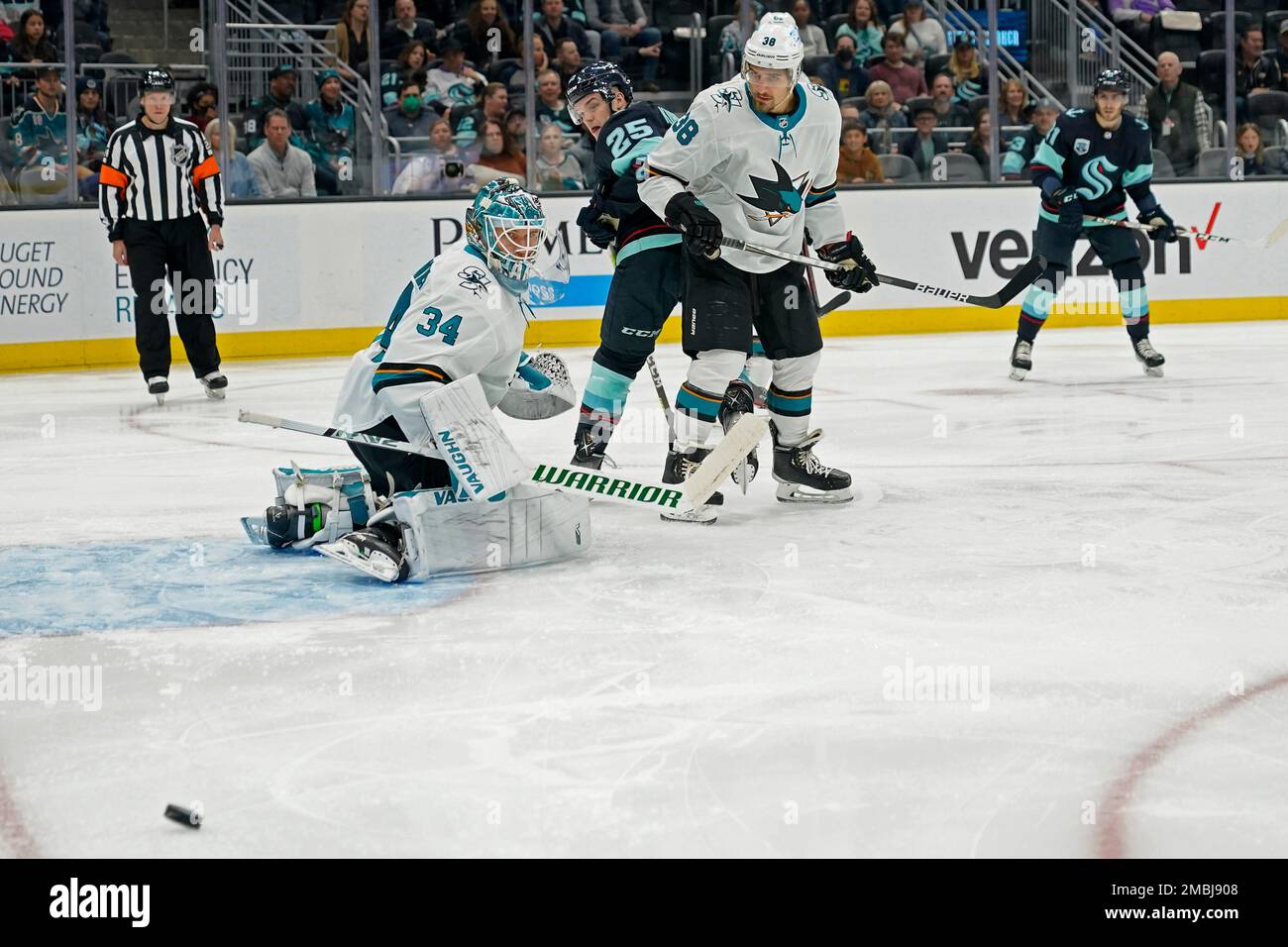 San Jose Sharks goaltender Kaapo Kahkonen (34) watches the puck along ...