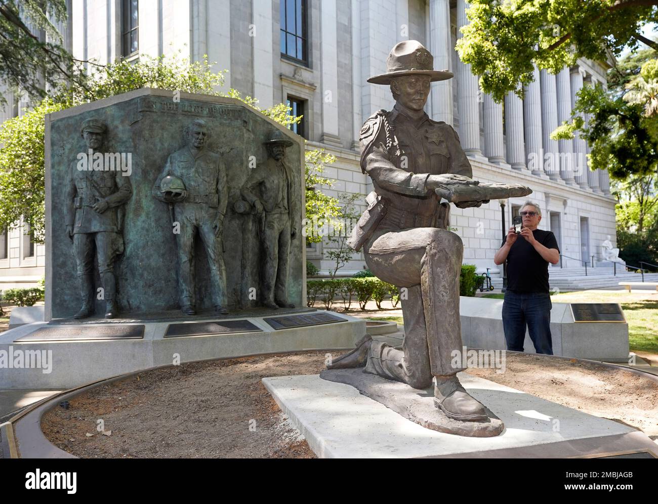 Sculptor Christopher Slatoff takes a photo of his sculpture, "Female ...