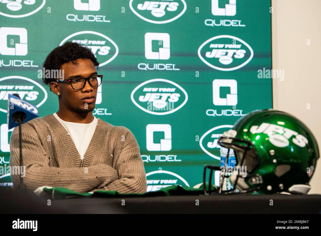 Garrett Wilson speaks at a New York Jets NFL football draft news ...