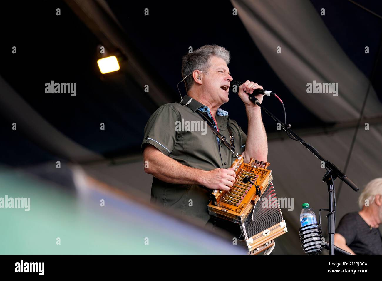 Steve Riley of Steve Riley & the Mamou Playboys performs with his band ...