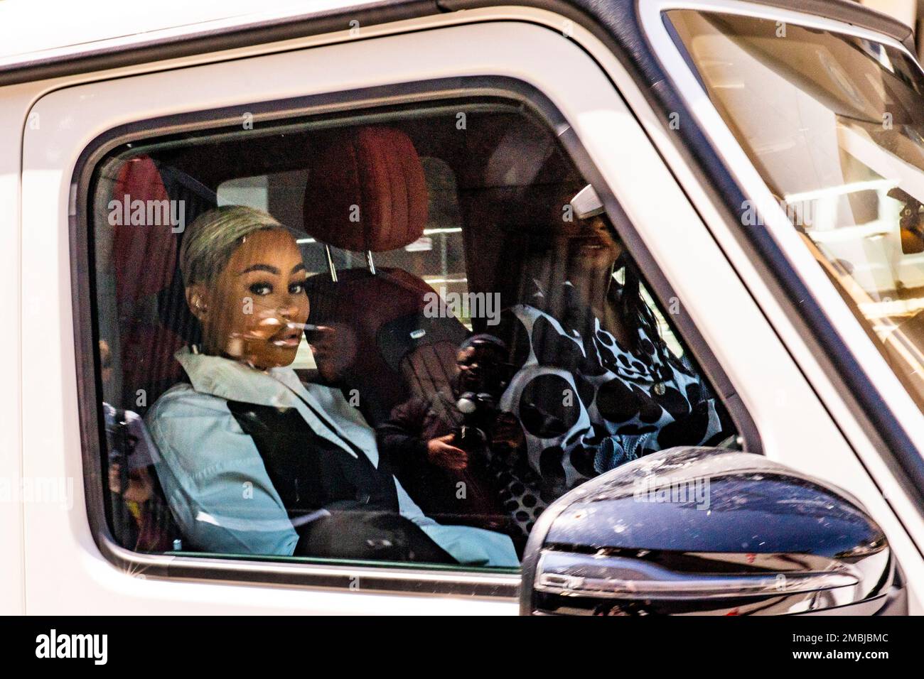 Blac Chyna, left, arrives for her lawsuit against the Kardashian family ...