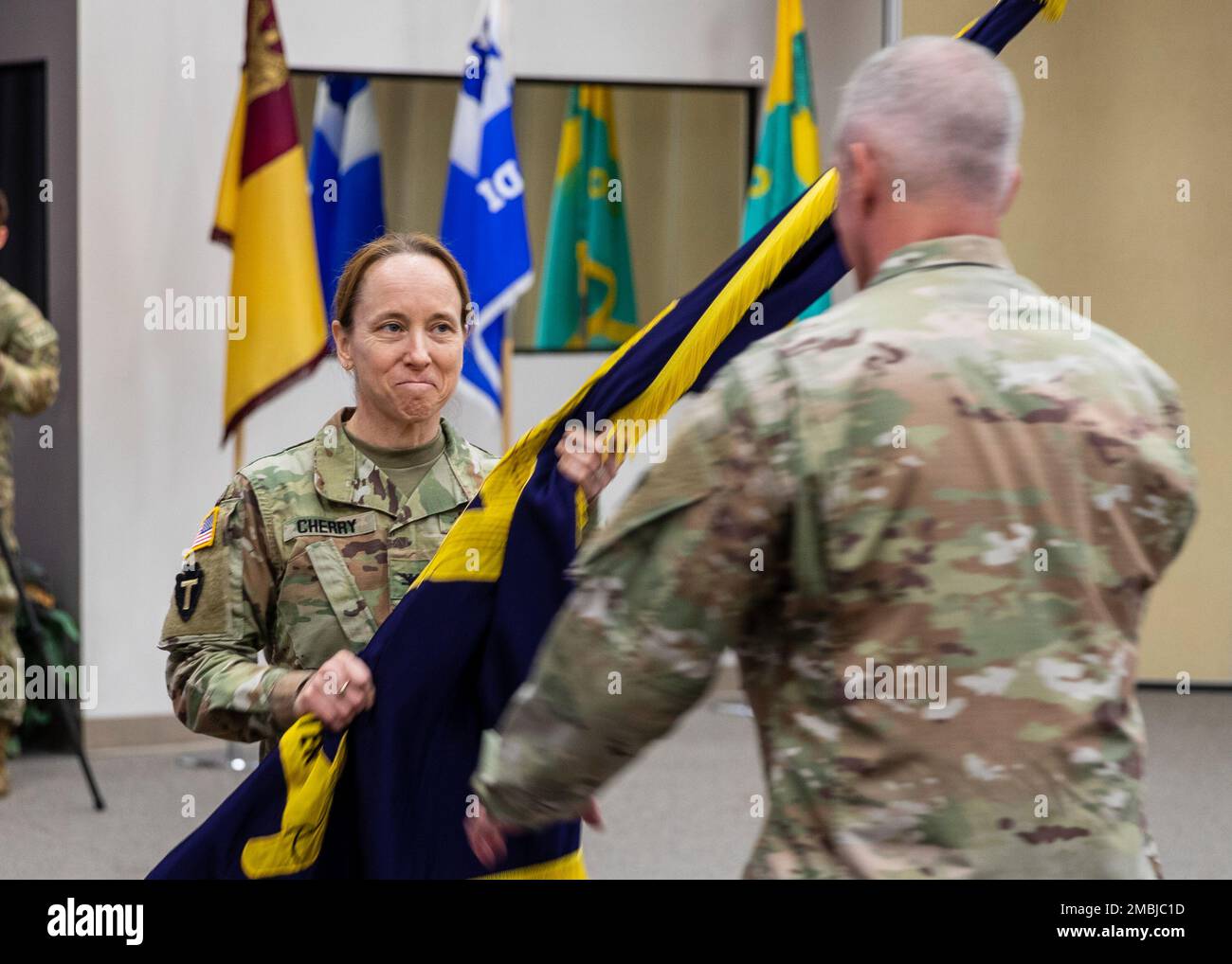Colonel Catherine L. Cherry passes the NGPEC flag back to Command ...