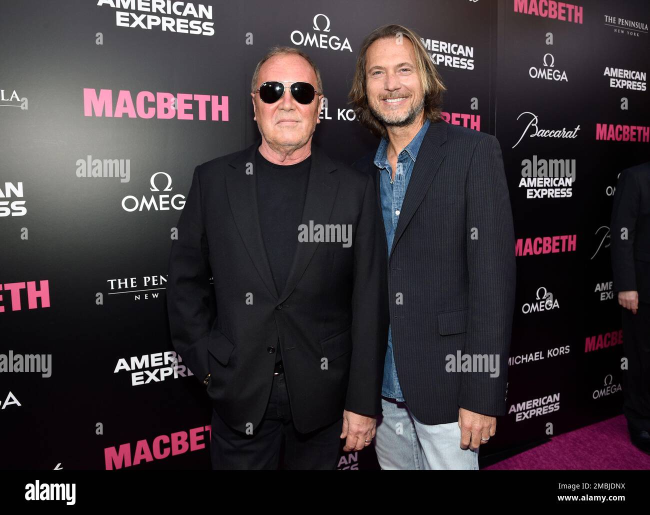 Designer Michael Kors, left, and boyfriend Lance LePere attend the ...