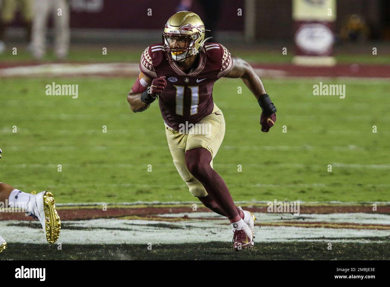 FILE - Florida State defensive end Jermaine Johnson II plays in the ...
