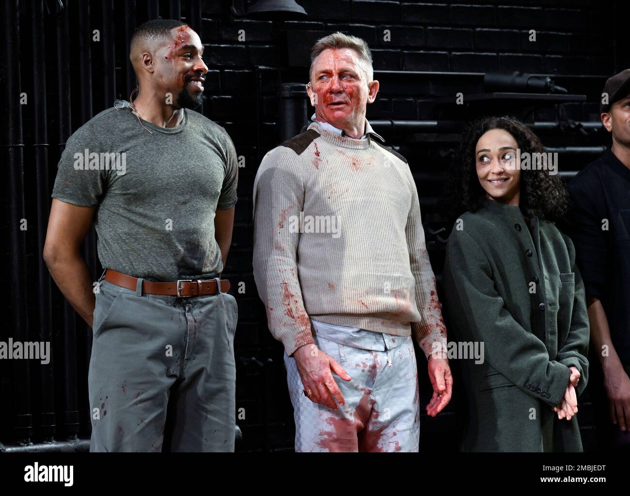 Actors Grantham Coleman, left, Daniel Craig and Ruth Negga participate in the curtain call ...