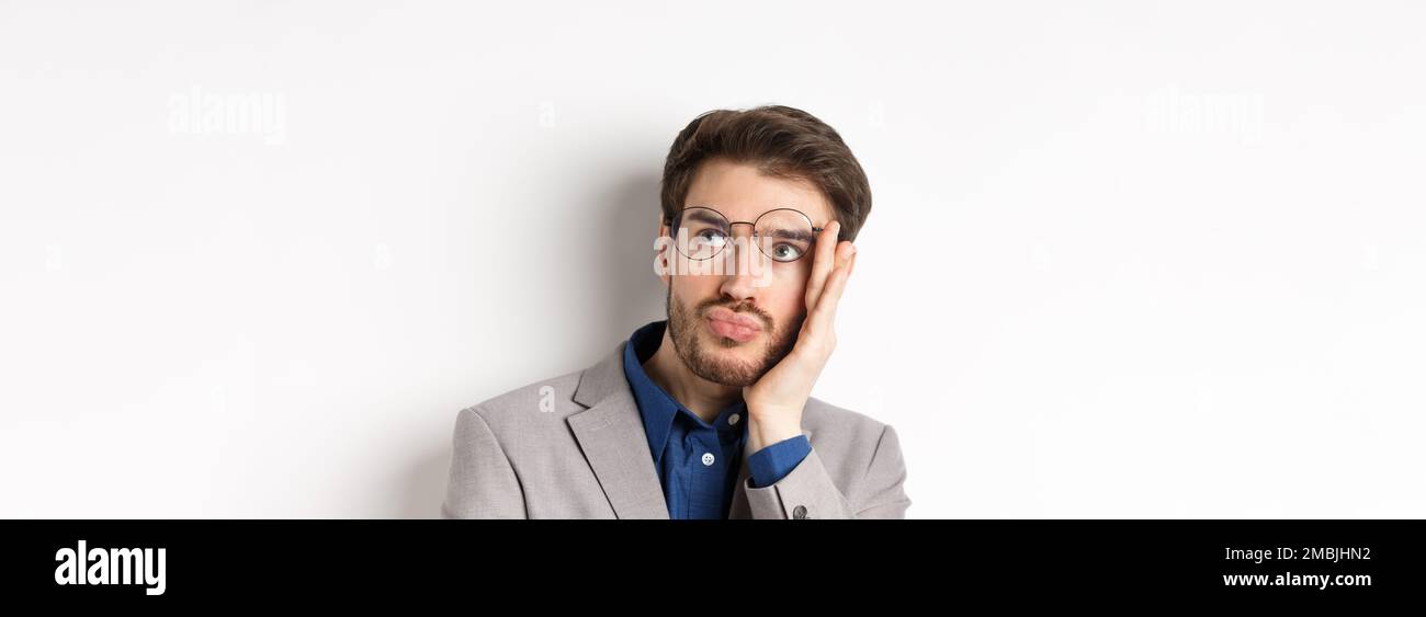 Close-up of shocked tired office worker takes-off glasses and stare at ...
