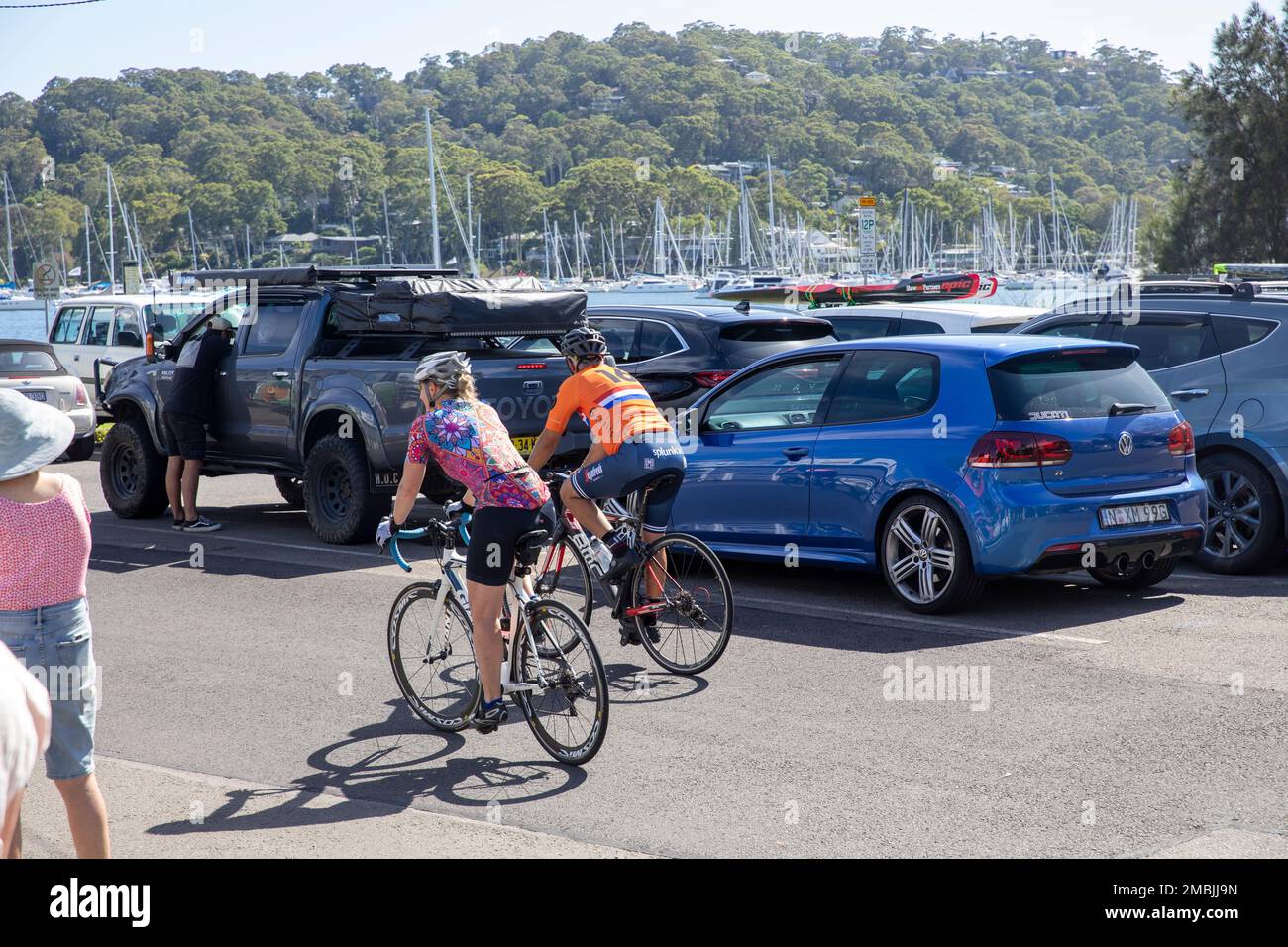 Cyclists, male and female middle aged riding bikes bicycles near ...