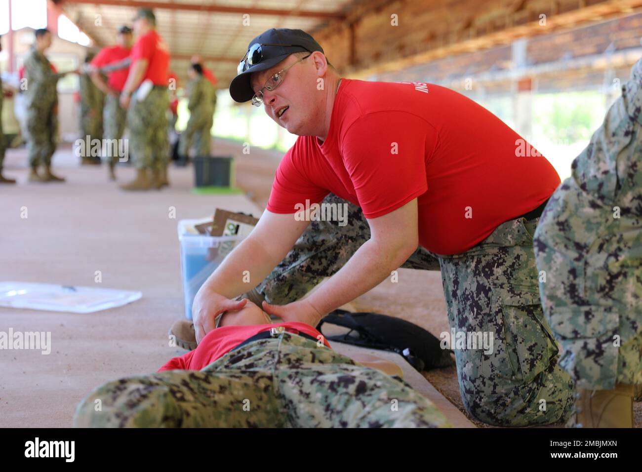 U.S. Navy Hospitalman 1st Class Jon Wayne Hill with Fleet Marine Force ...