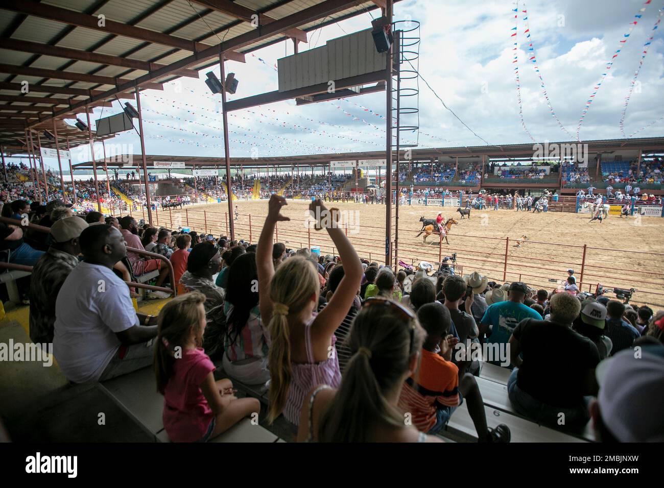 A sold-out crowd packs the 10,000 seat arena to cheer for the inmates ...