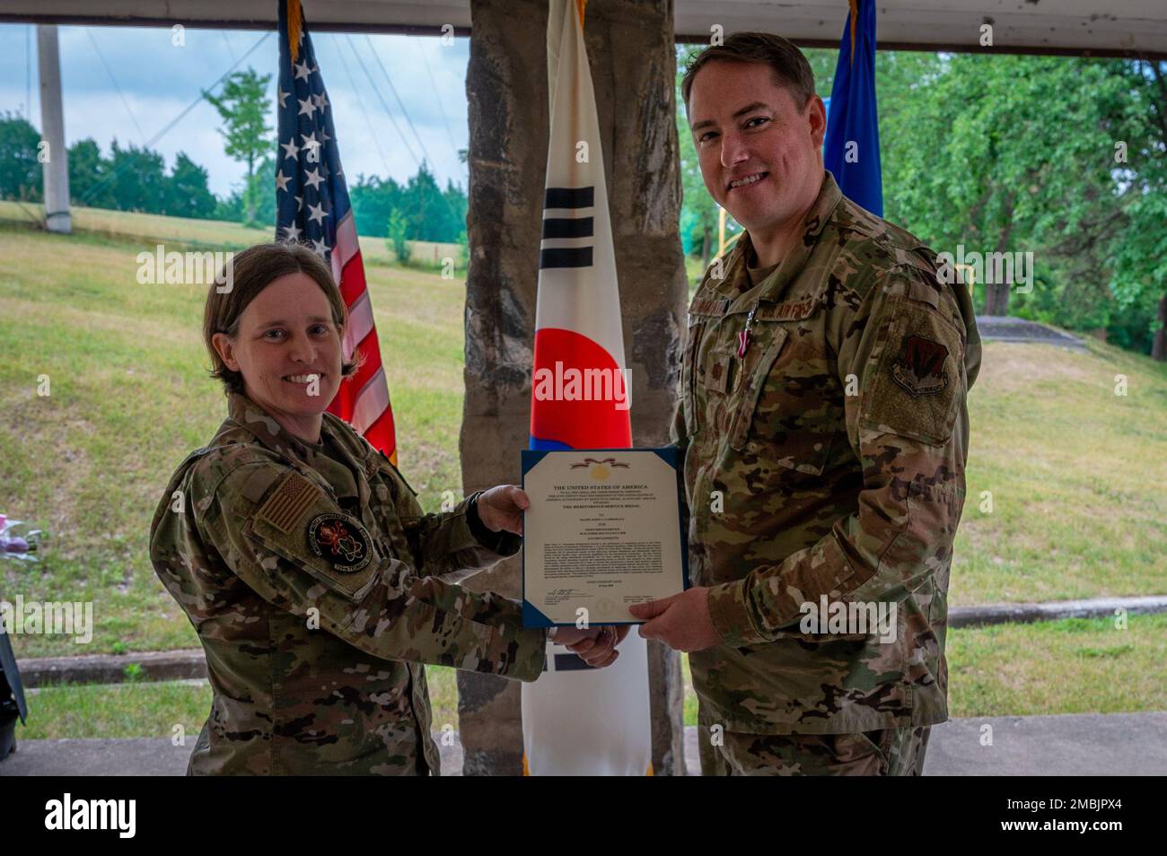 Lt. Col. Sarah Summers, left, 709th Technical Maintenance Squadron ...