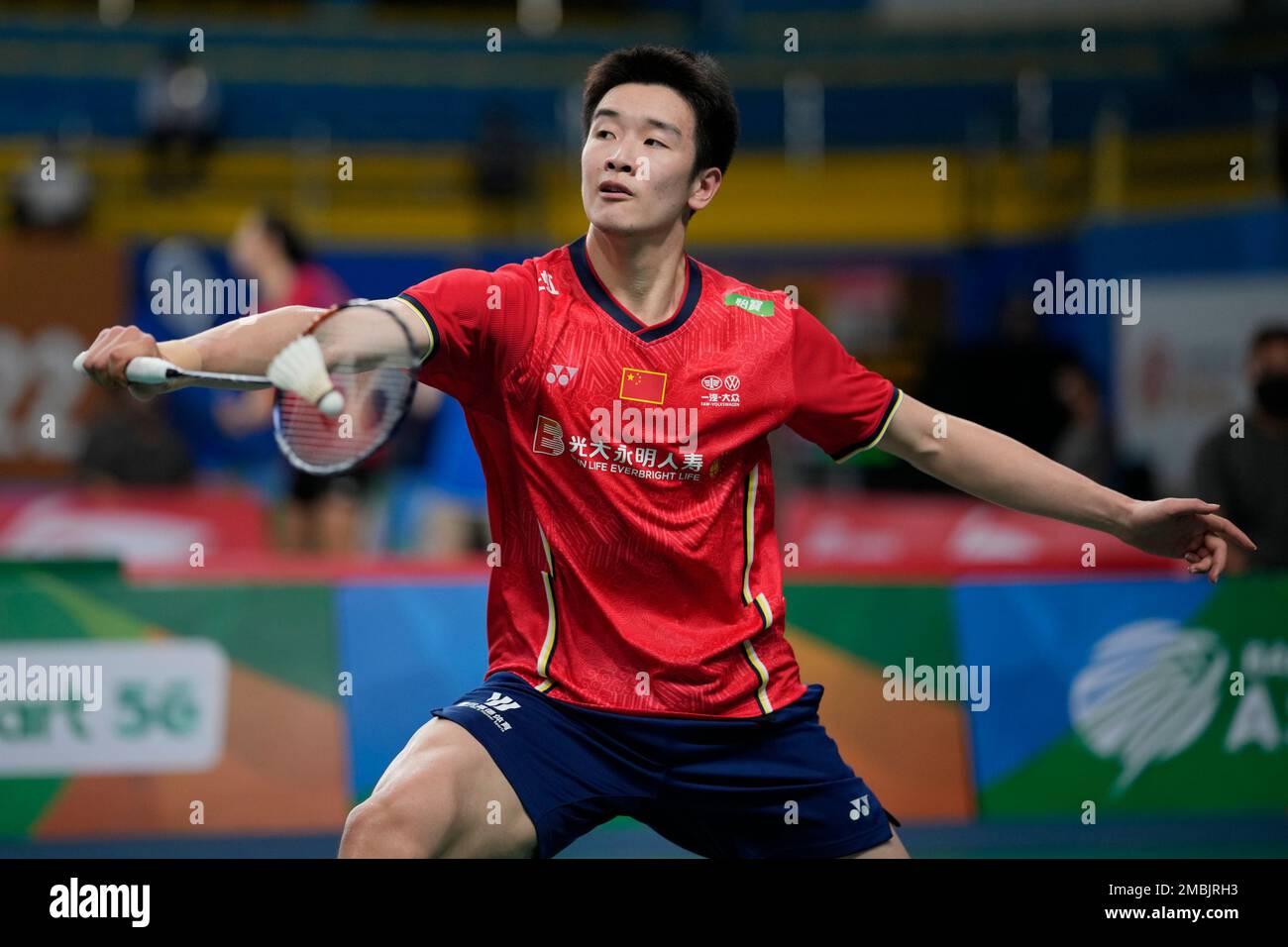 China's Li Shi Feng competes against India's Lakshya Sen during the men ...