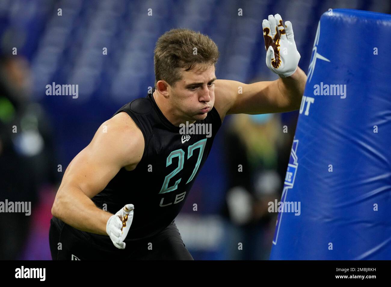 FILE - Wyoming linebacker Chad Muma runs a drill at the NFL football ...