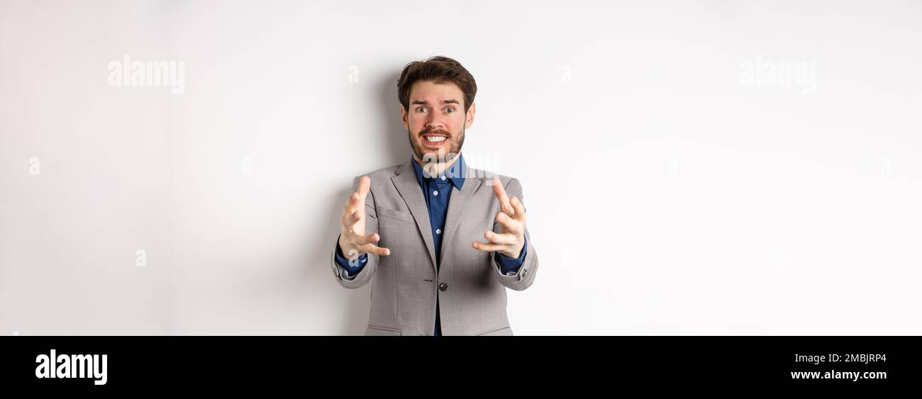 Distressed businessman stretch out hands to strangle annoying person ...