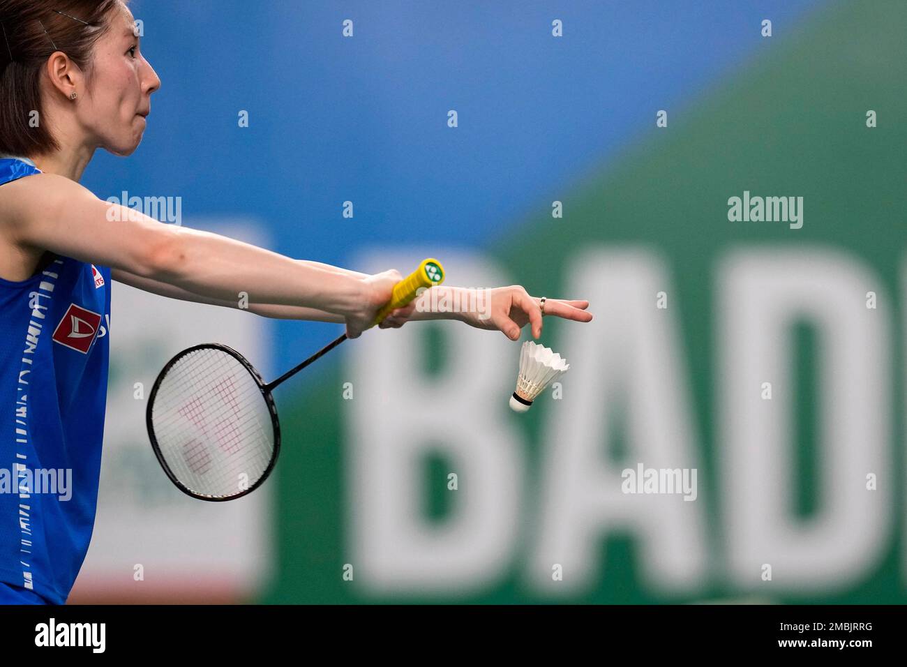 Japan's Chiharu Shida serves against their Philippine opponents during ...